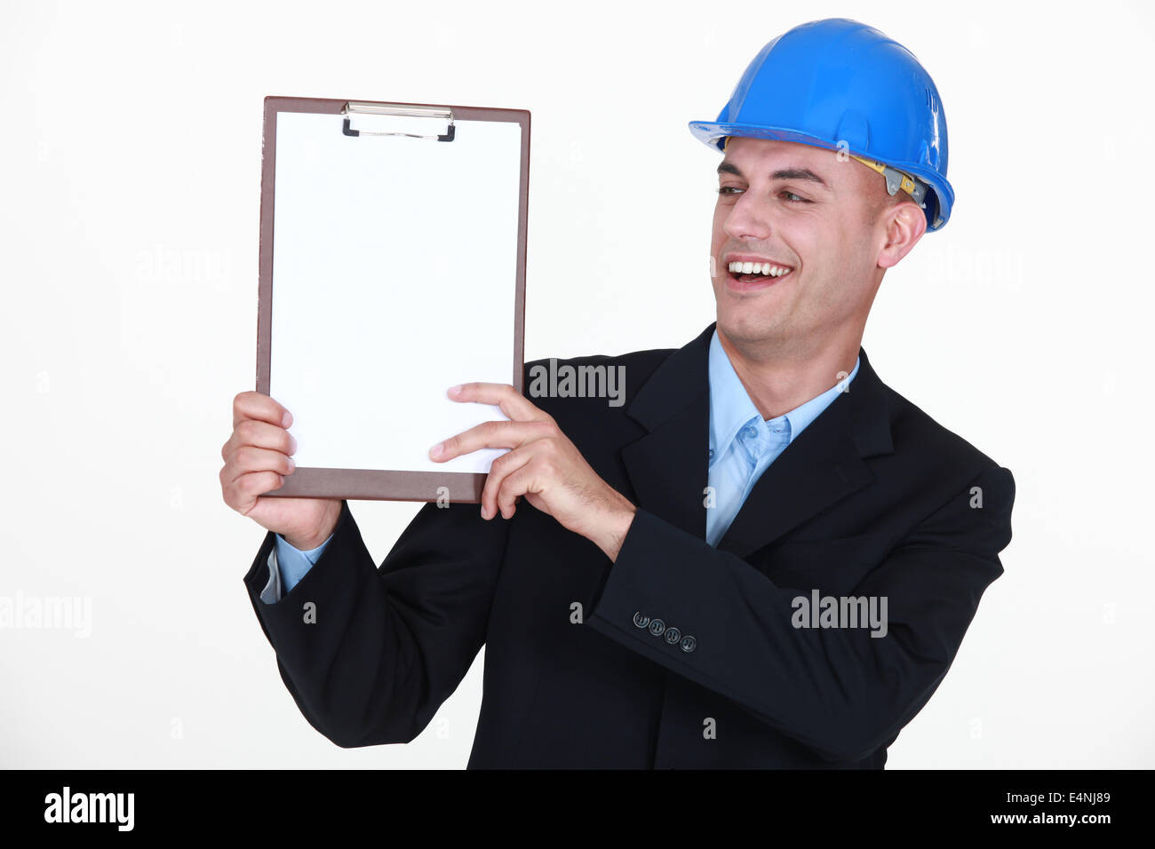 Happy man holding clip-board Stock Photo - Alamy