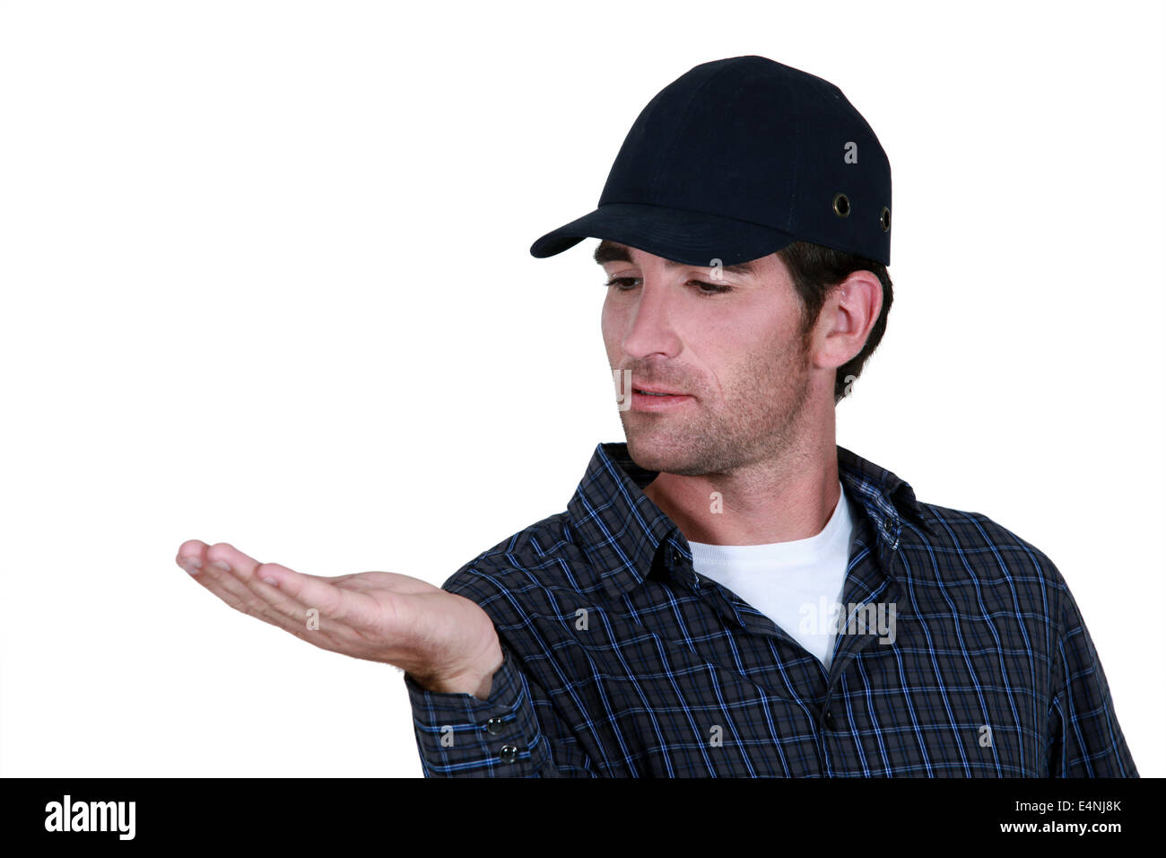 A man looking at his hand palm Stock Photo - Alamy