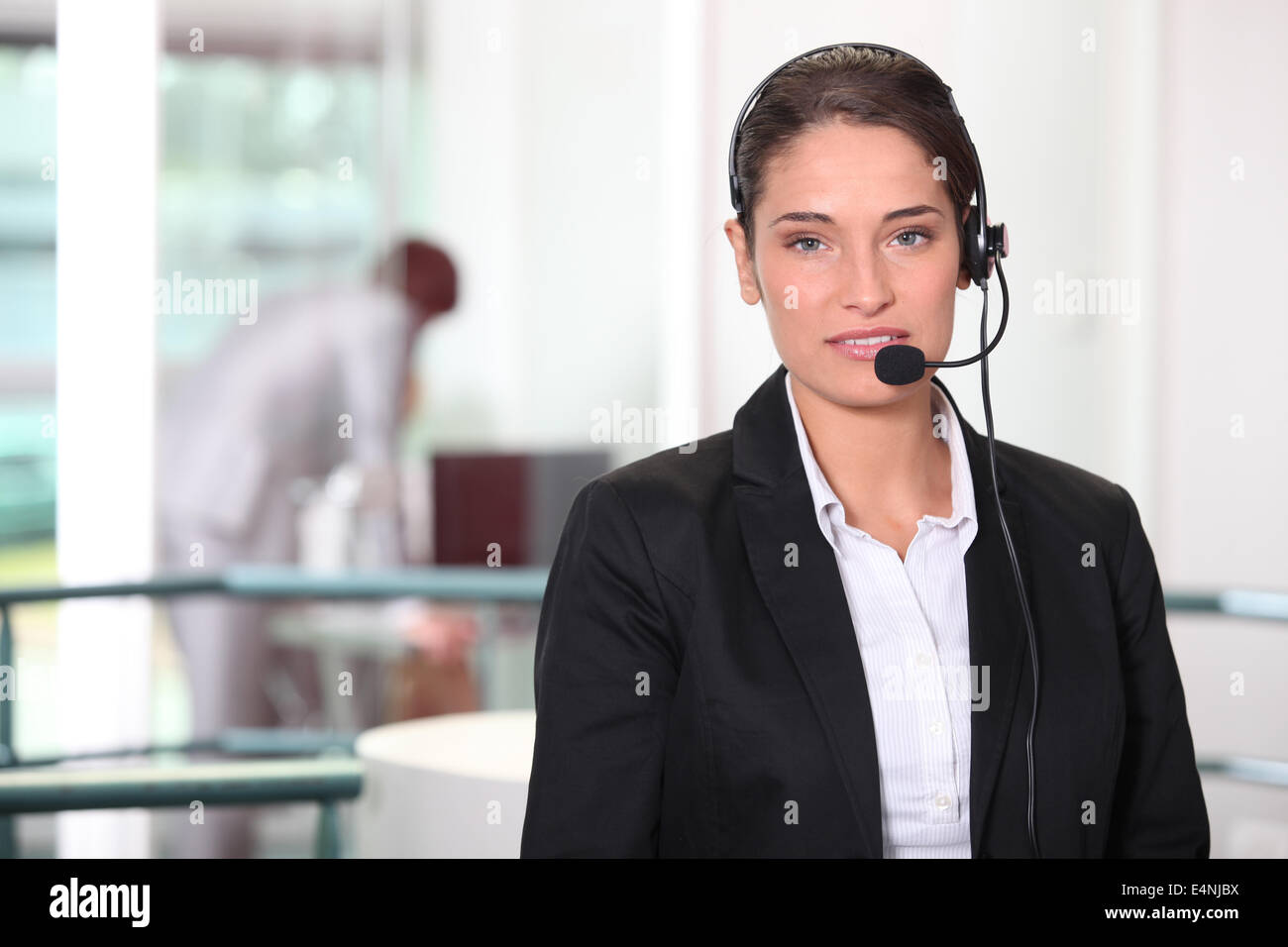 Woman wearing headset Stock Photo - Alamy