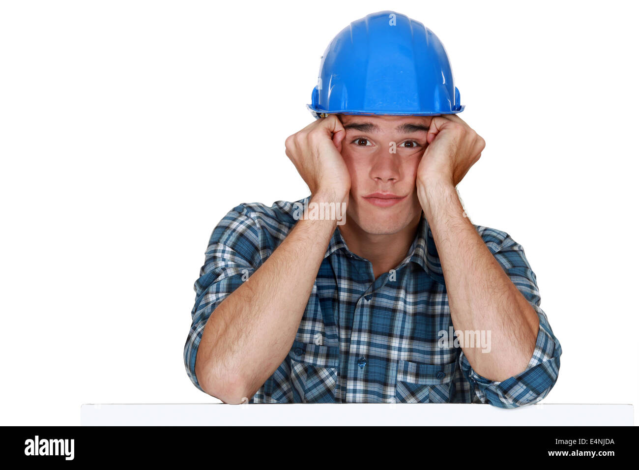 Bored construction worker Stock Photo - Alamy