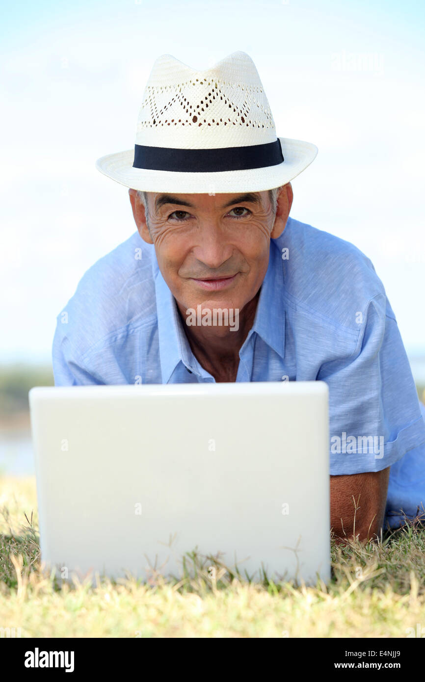 Man with computer Stock Photo - Alamy