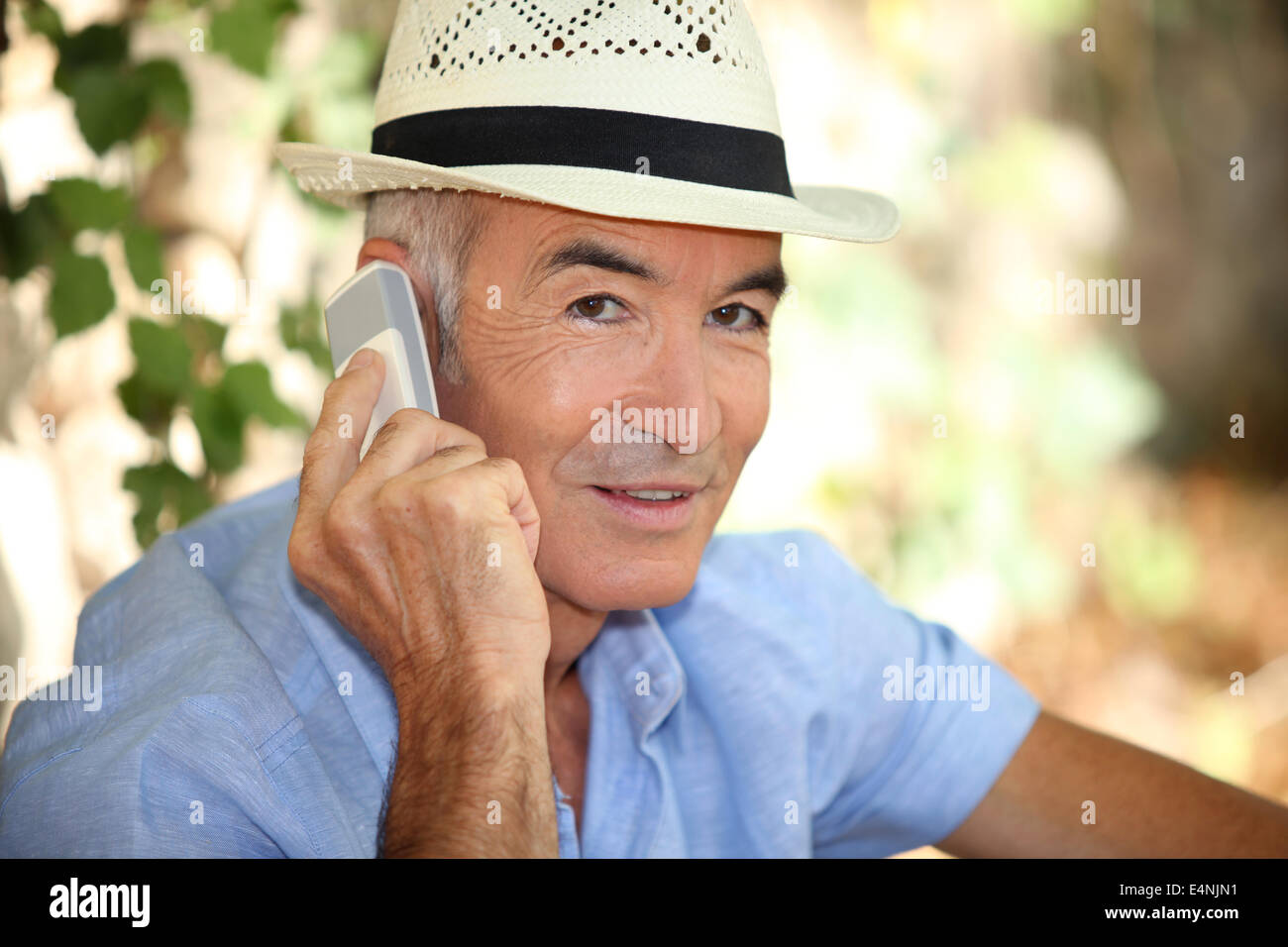 Old man with telephone Stock Photo - Alamy