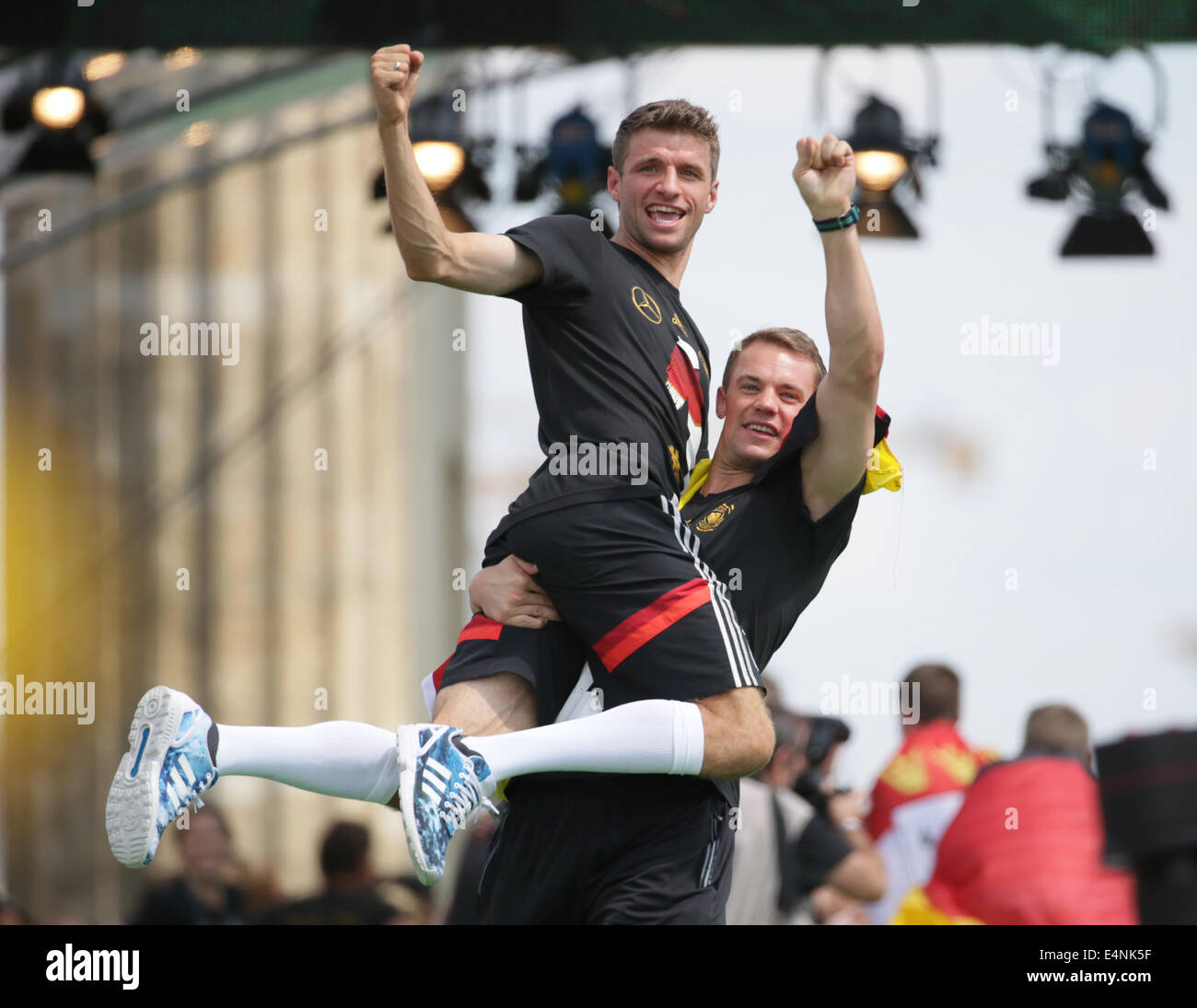Berlin, Germany. 15th July, 2014. Germany's Thomas Mueller und Manuel ...
