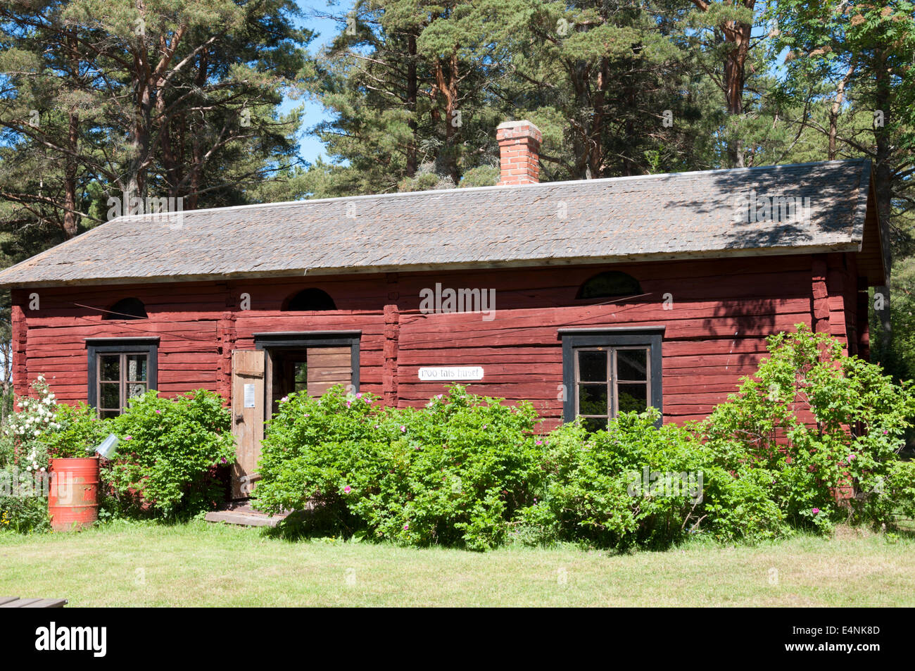 Finnish log house with shingle roof Stock Photo - Alamy