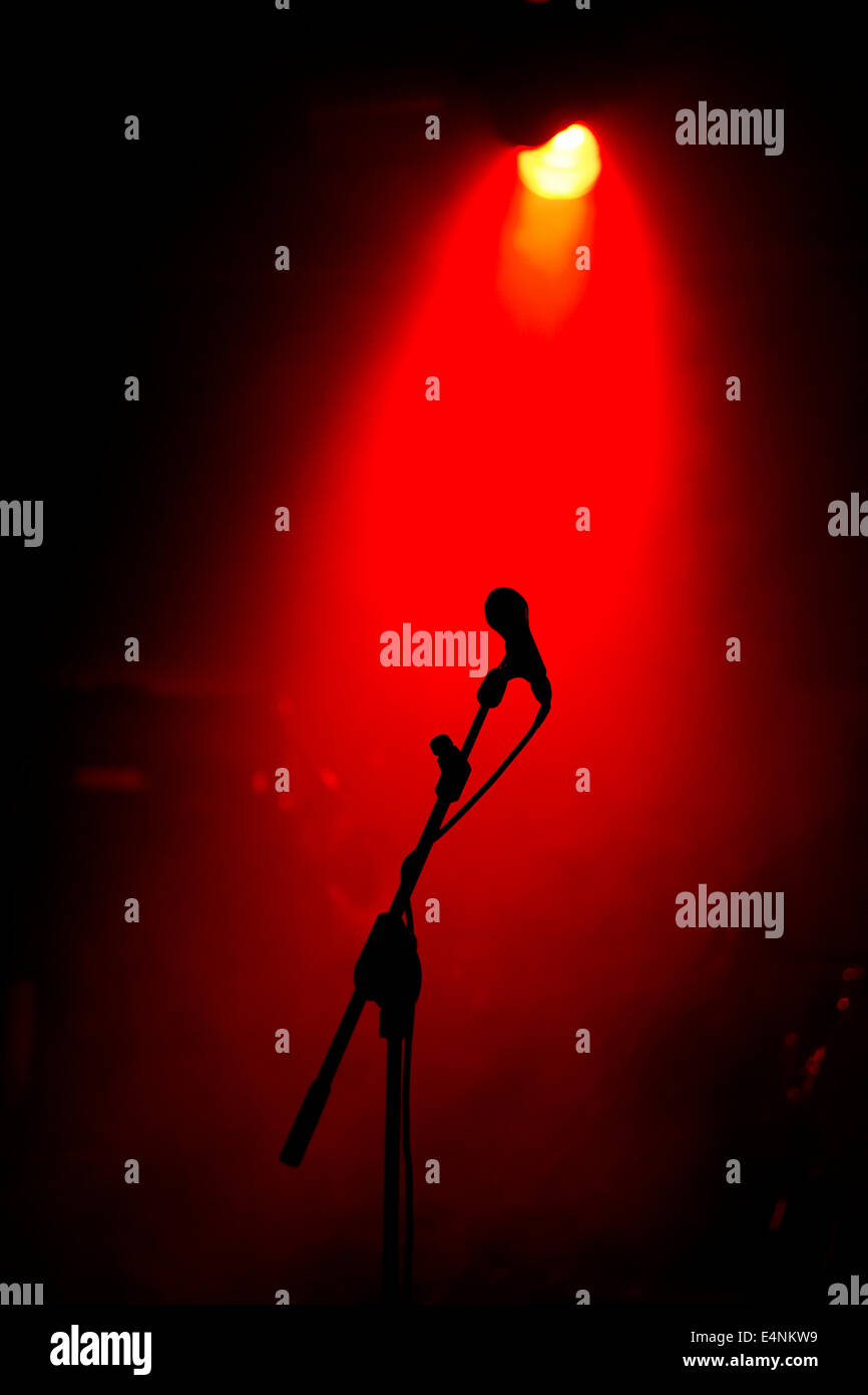 Microphone on empty stage Stock Photo - Alamy