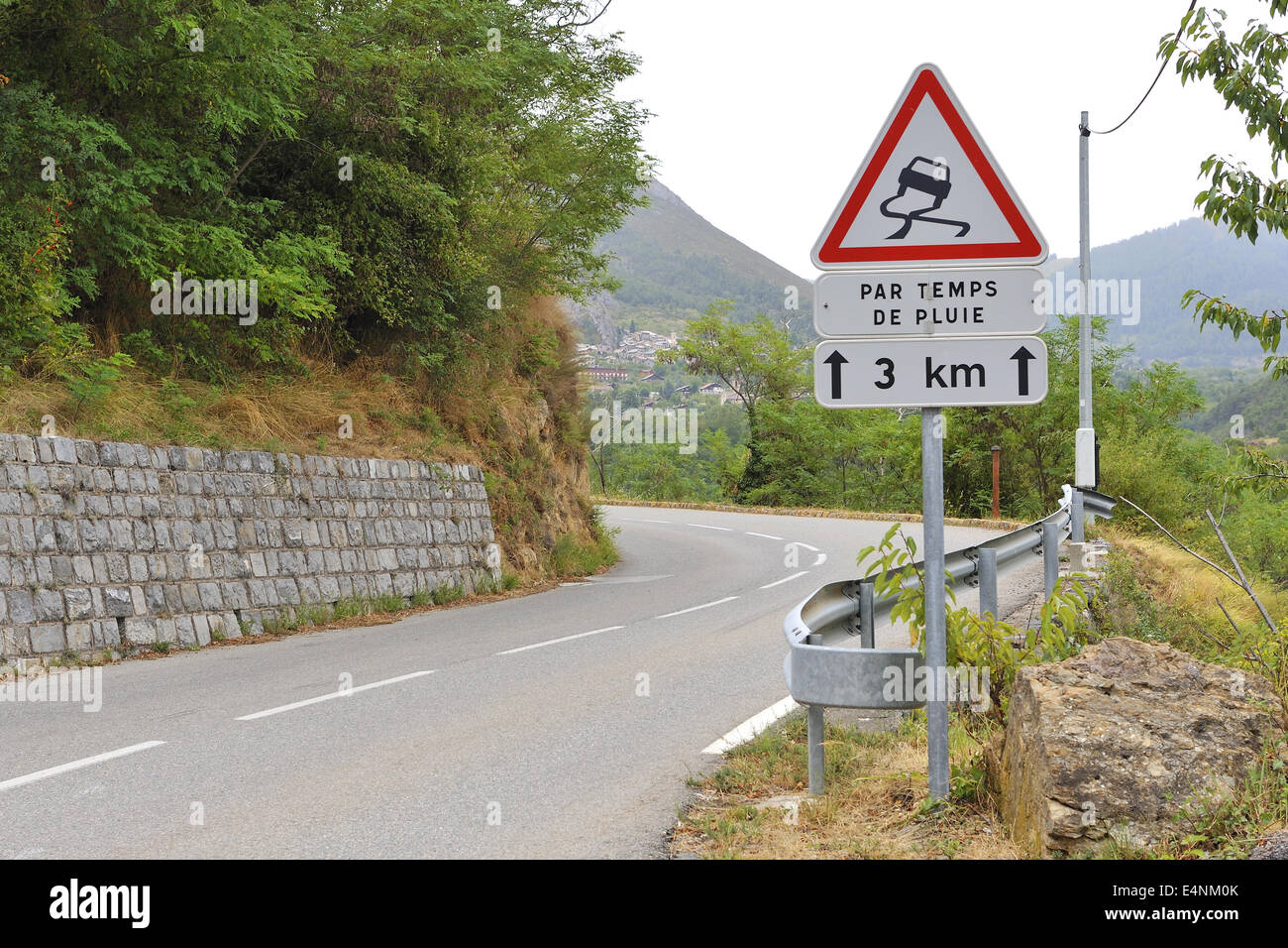 Dangerous bend traffic sign hi-res stock photography and images - Alamy