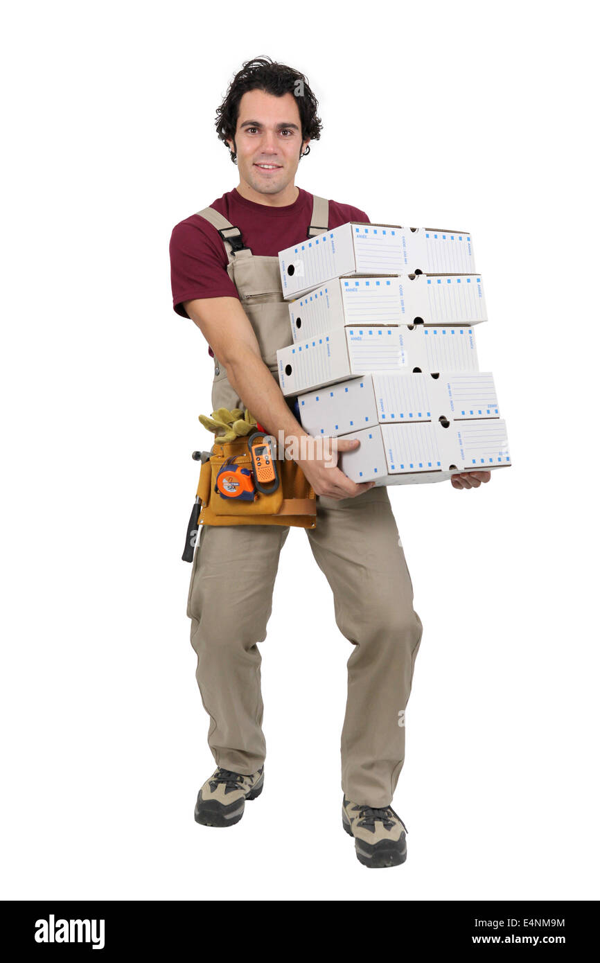 Man carrying cardboard boxes Stock Photo - Alamy