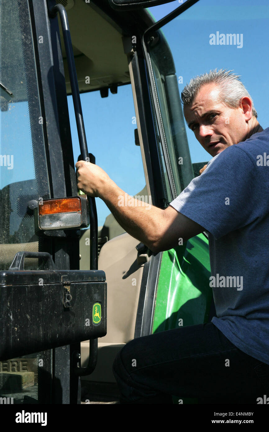 Man operating machinery Stock Photo - Alamy
