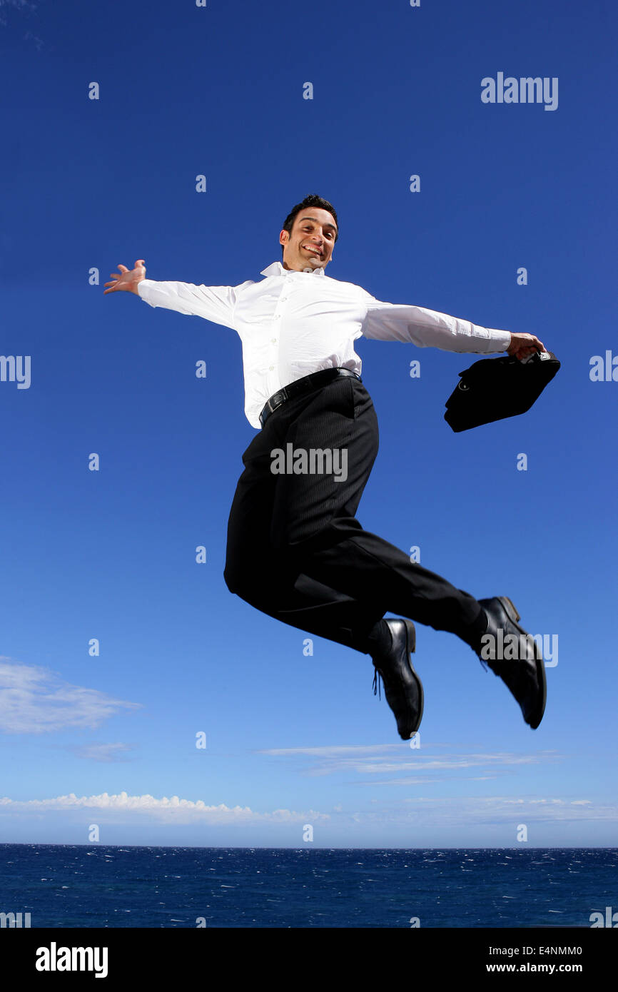 Happy high jump businessman hi-res stock photography and images - Alamy