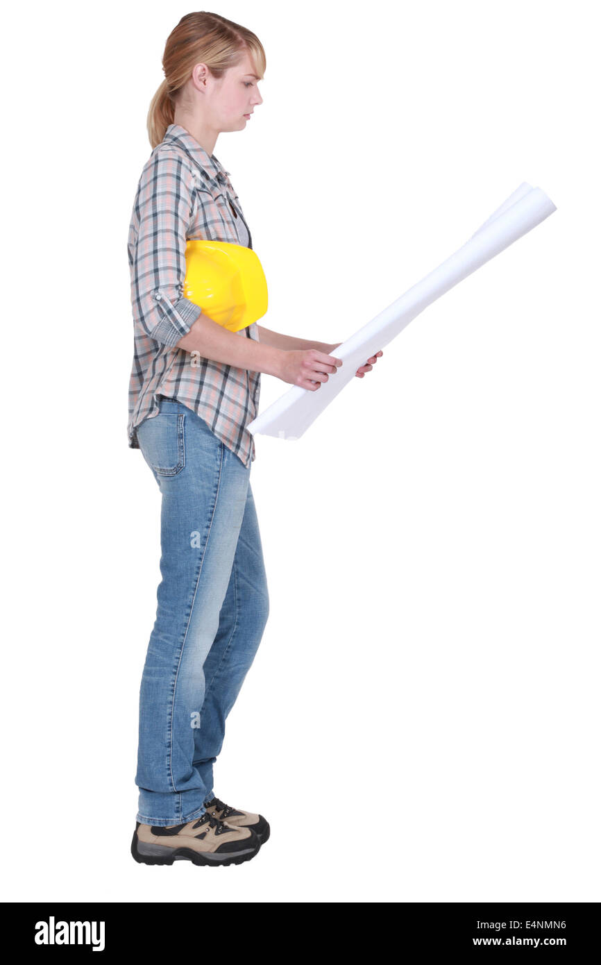 Woman holding building plans Stock Photo - Alamy Woman holding building plans Stock Photo - Alamy