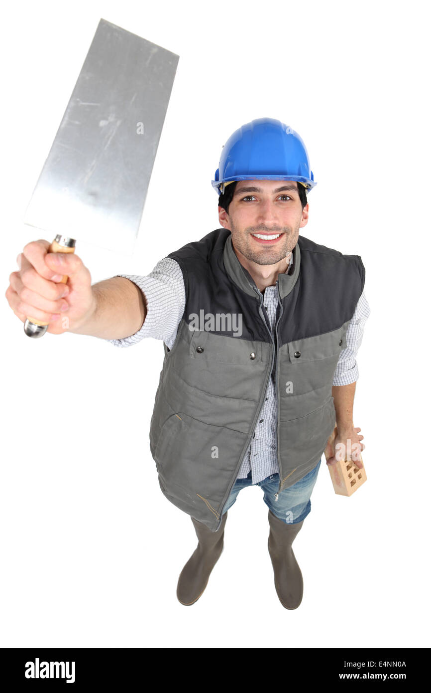 Builder with a trowel Stock Photo - Alamy