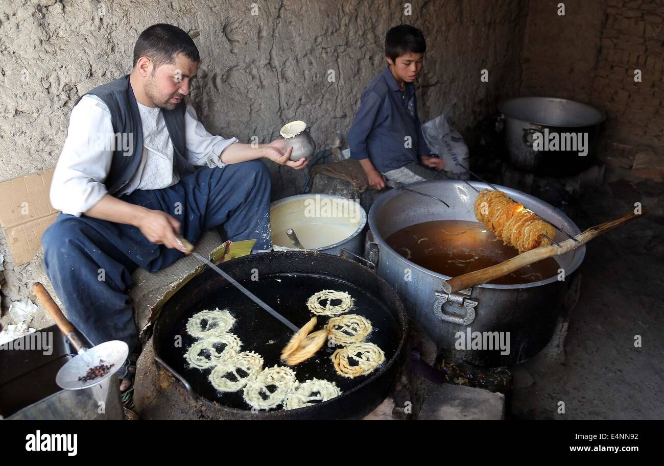 Ghazni, Afghanistan. 15th July, 2014. Afghan people make traditional ...