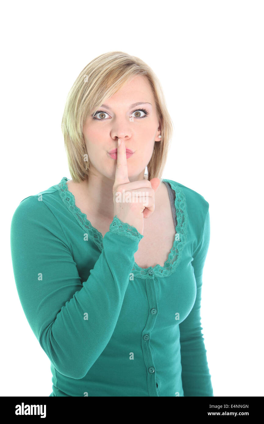 Excited woman giving a shushing gesture Stock Photo - Alamy
