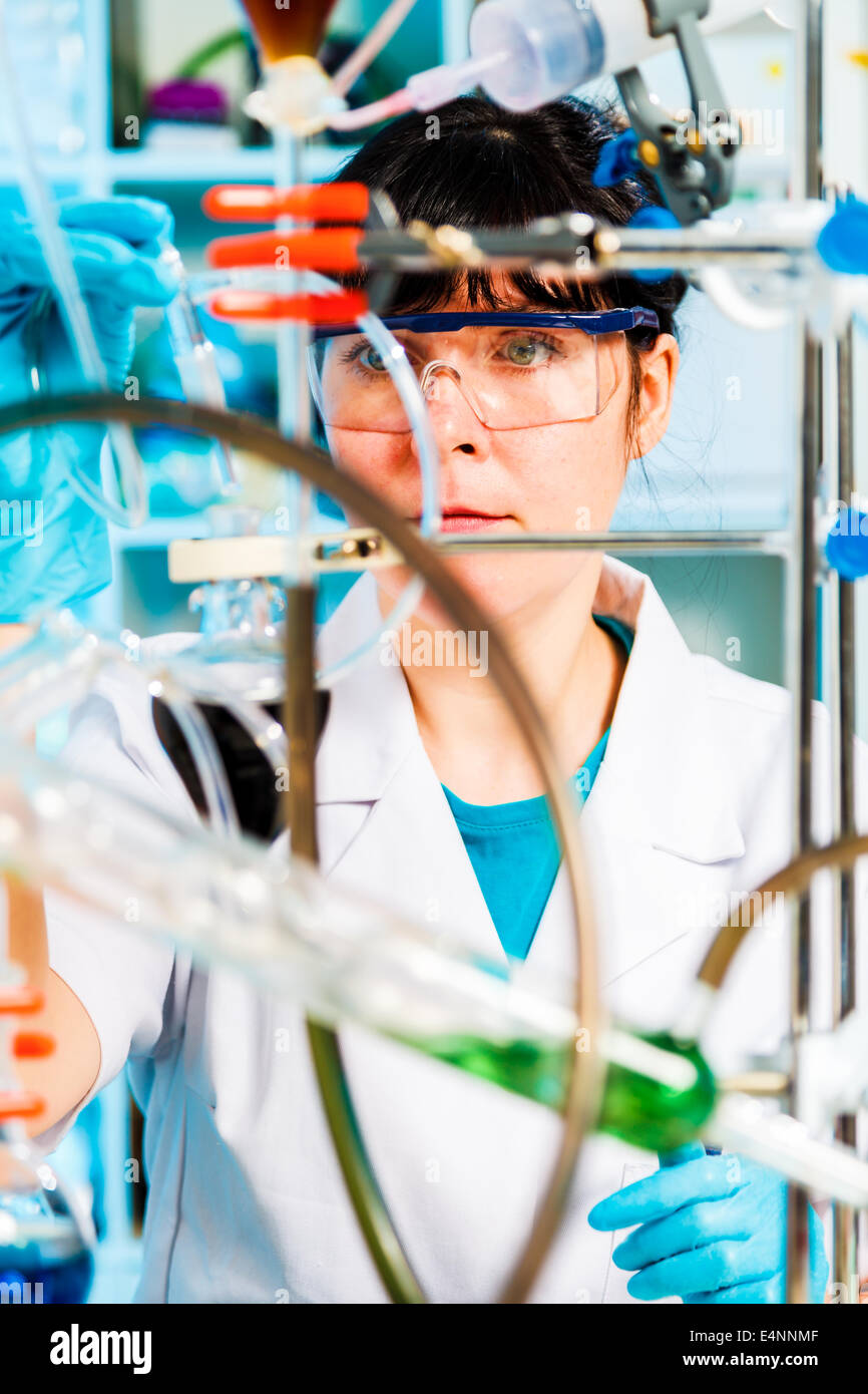 Woman in chemistry lab Stock Photo - Alamy