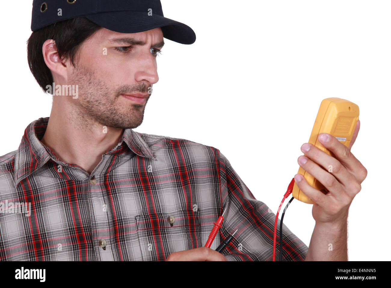 Man with a voltmeter Stock Photo - Alamy