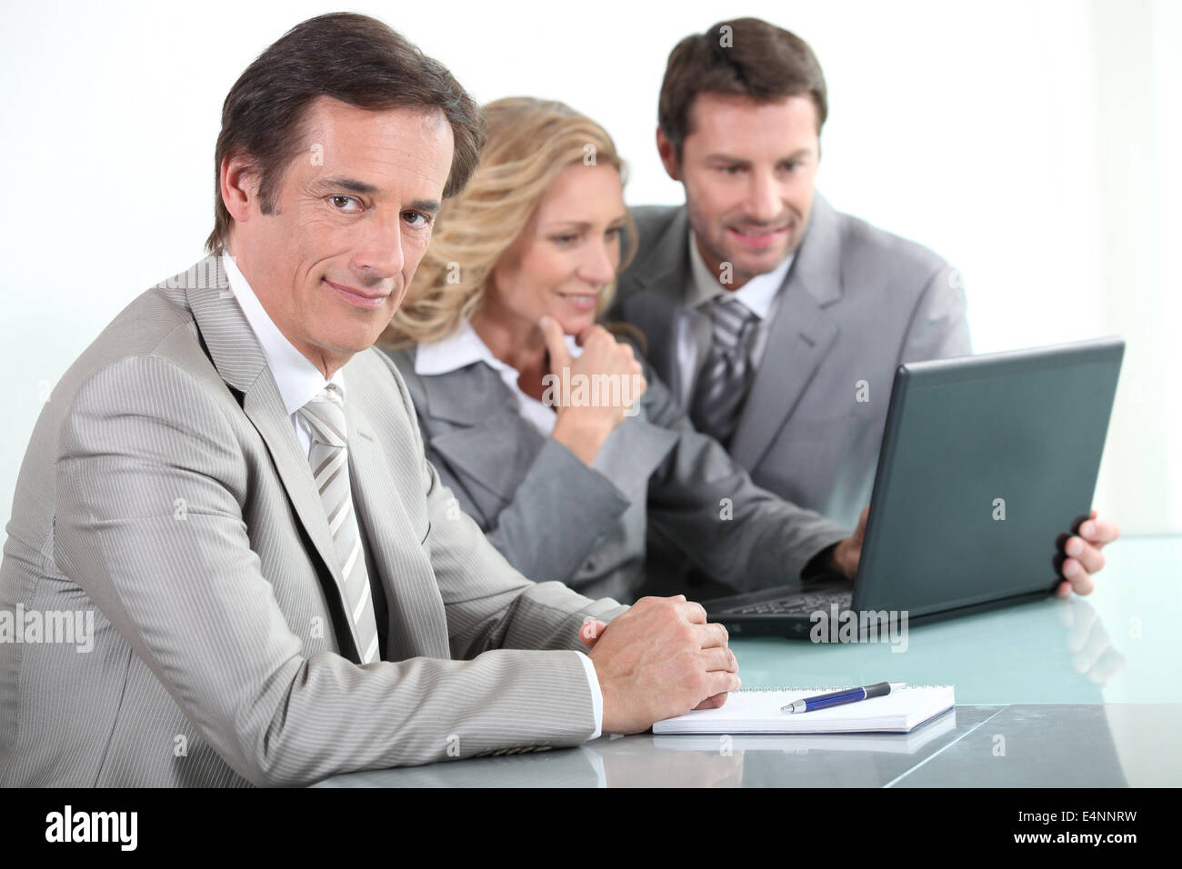 Collaborators on white background Stock Photo - Alamy