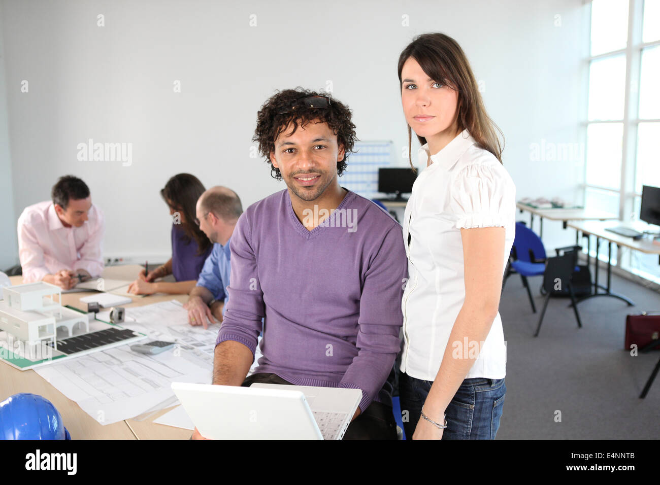Group in training room Stock Photo - Alamy