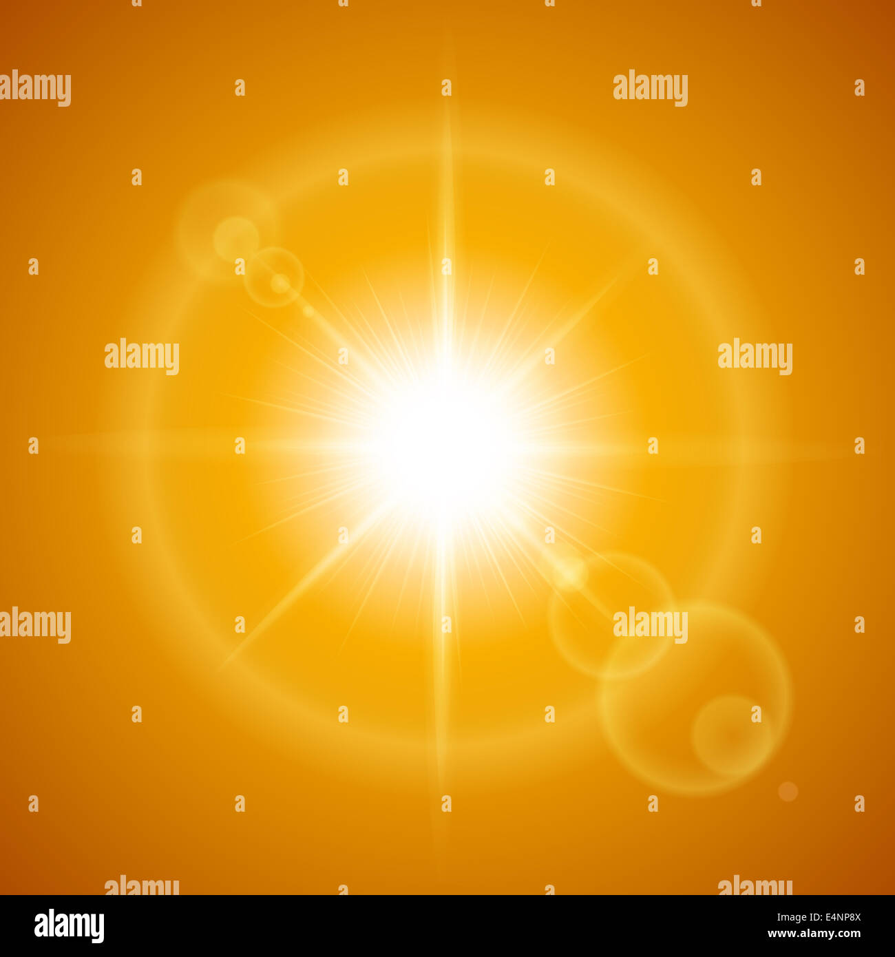 Glaring sun with lens flare over orange background Stock Photo - Alamy