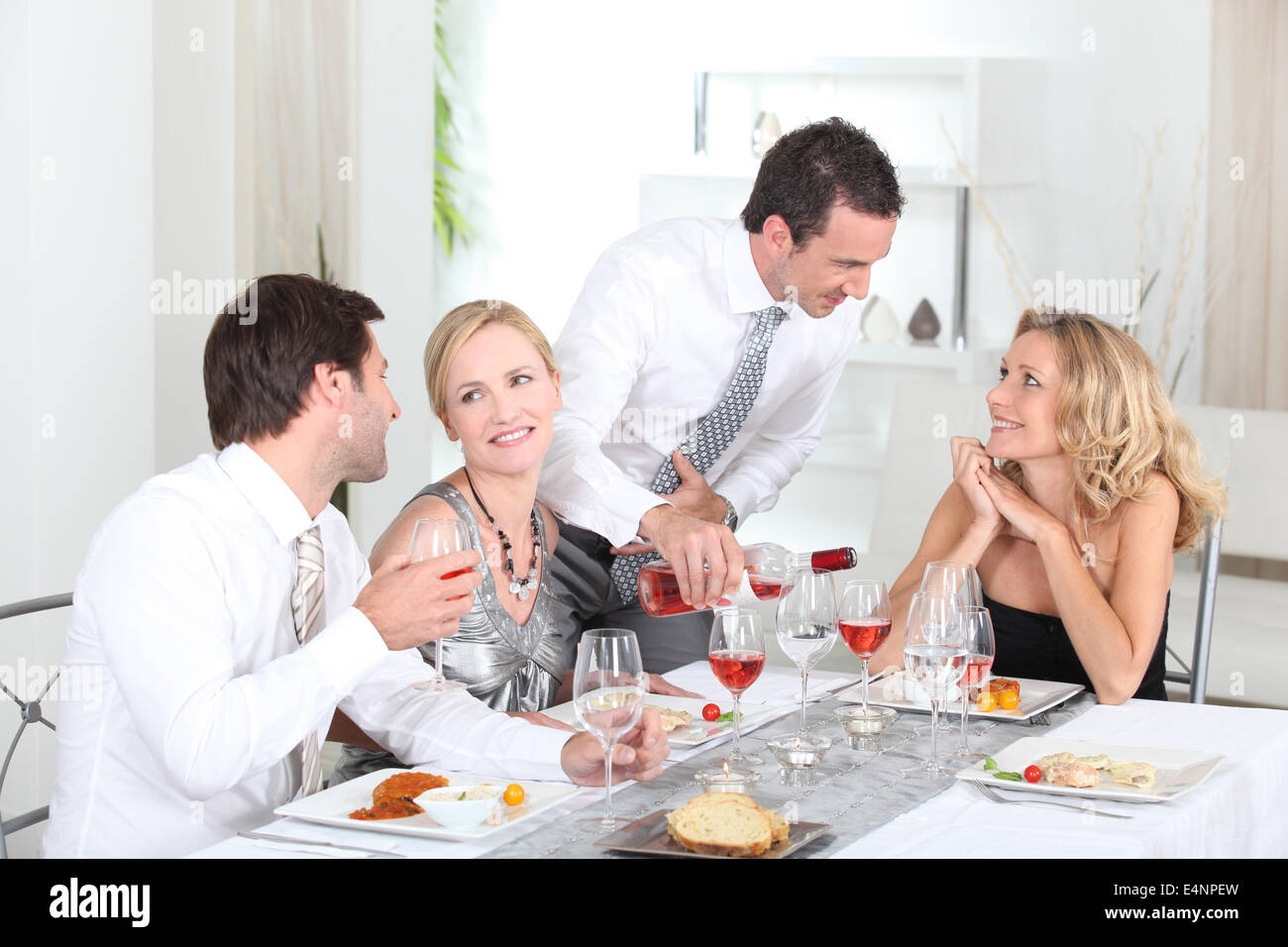 Friends having a party Stock Photo - Alamy