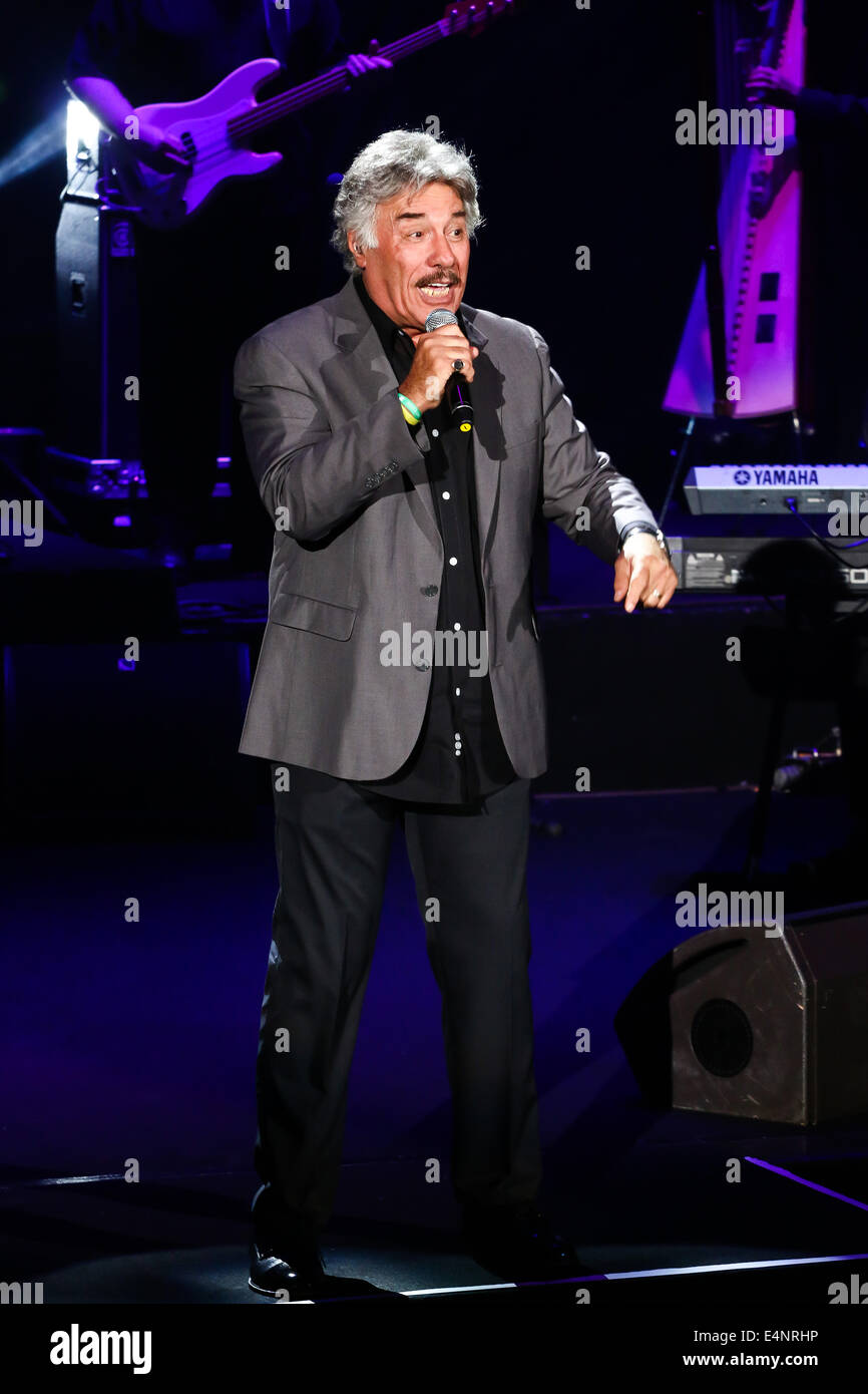 Singer Tony Orlando performs at the stage of his concert in Taipei ...