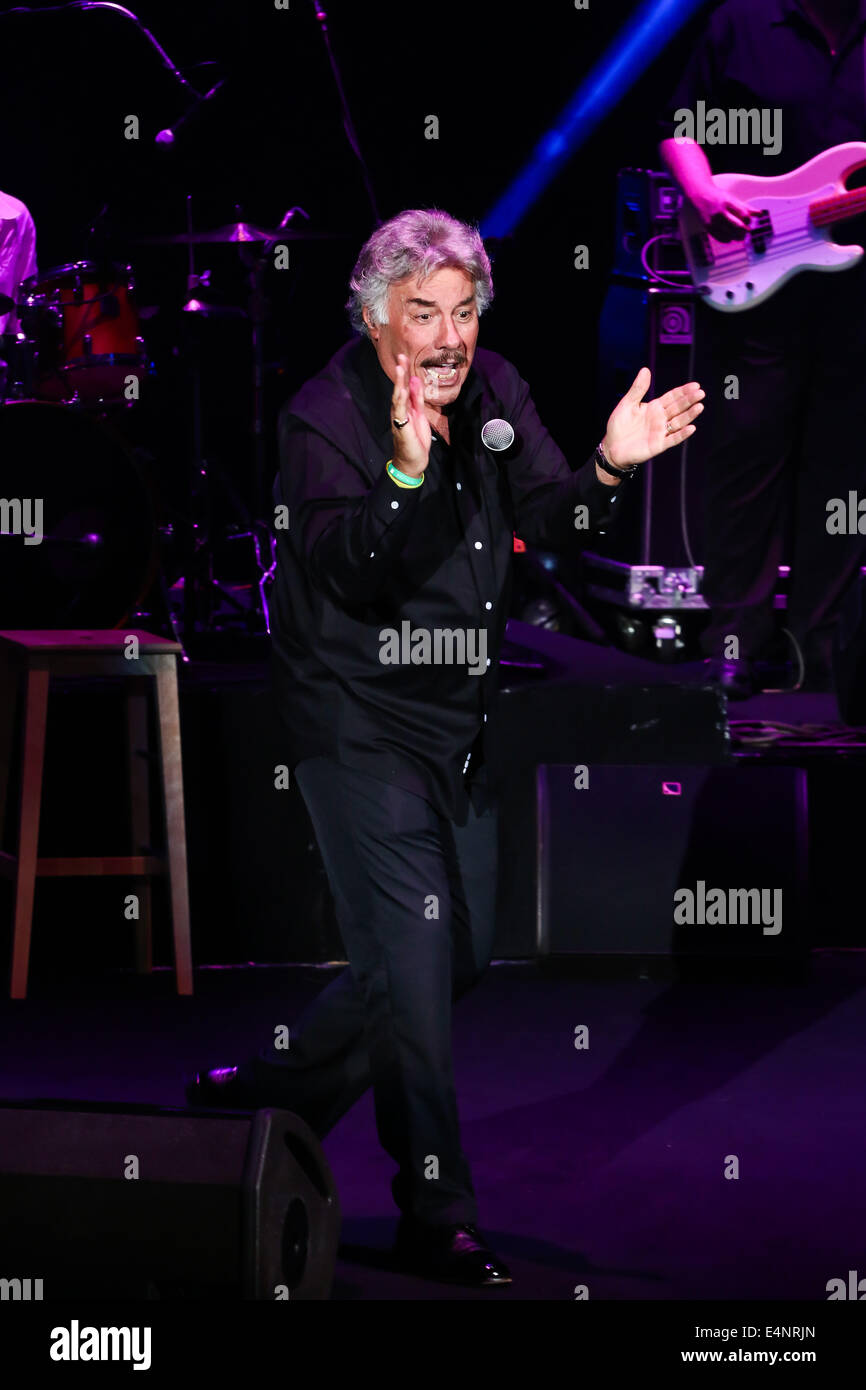 Singer Tony Orlando performs at the stage of his concert in Taipei ...