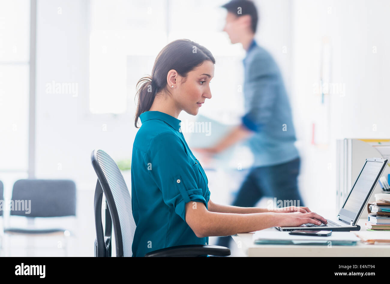 People working in office Stock Photo - Alamy