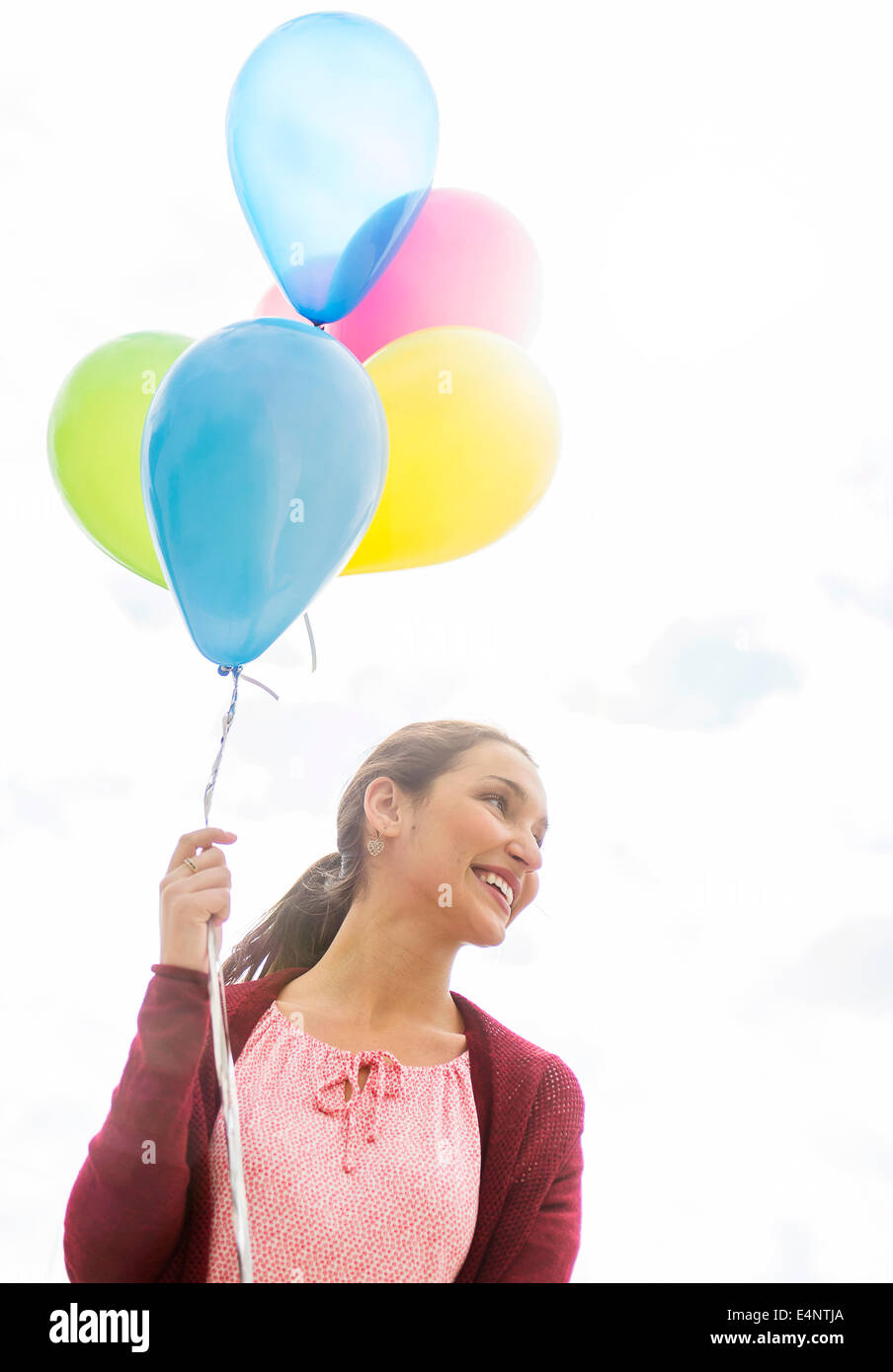 Woman and balloons hi-res stock photography and images - Alamy