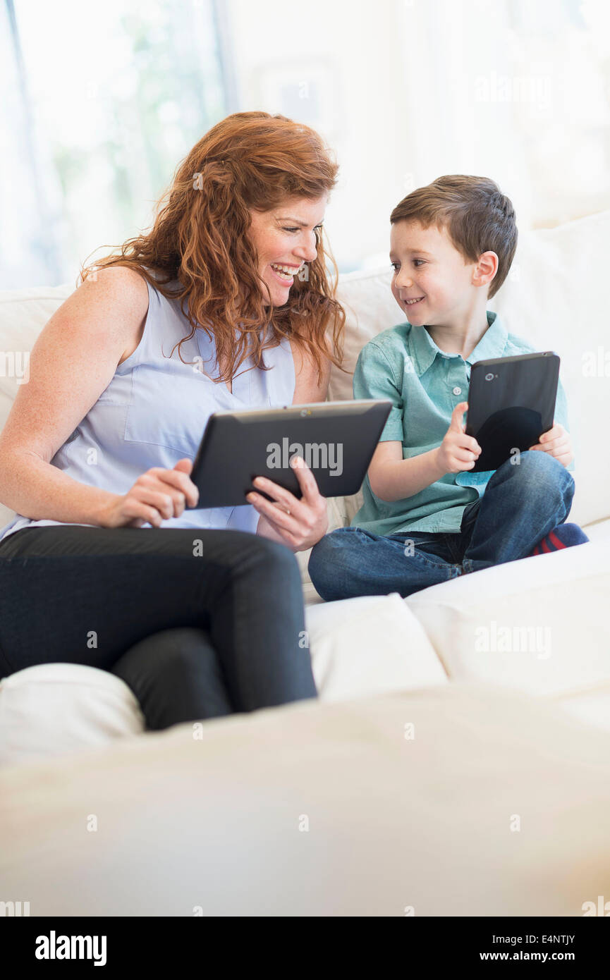 Kids using tablets hi-res stock photography and images - Alamy