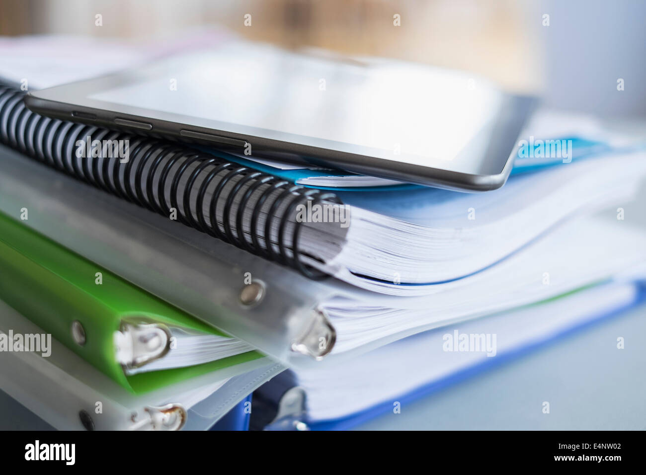 Close up of stack of notebooks with digital tablet on top Stock Photo ...