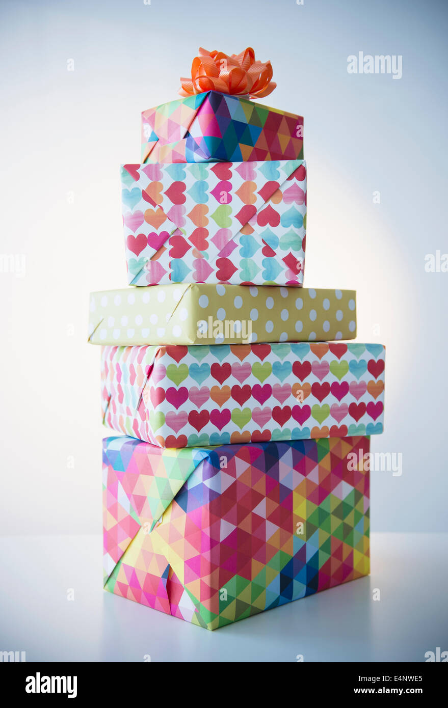 Studio Shot of stack of colorful presents Stock Photo - Alamy