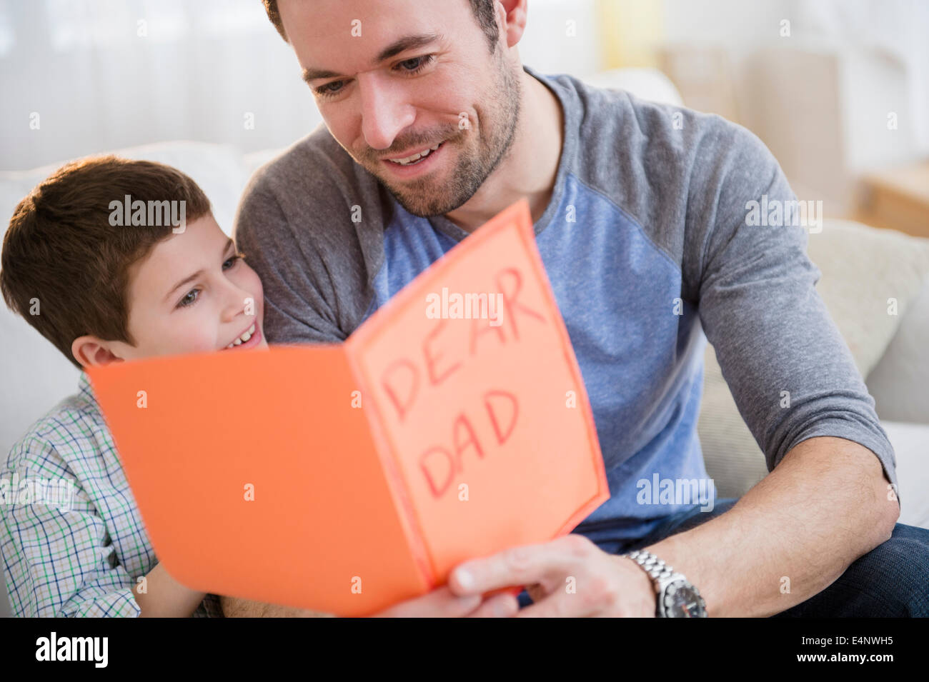 Aged father adult son reading hi-res stock photography and images - Alamy
