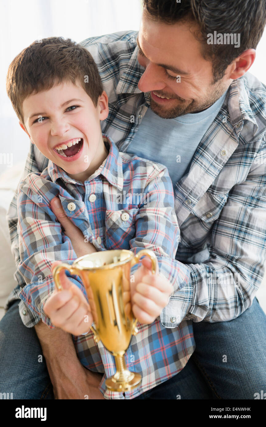 Kids with trophies hi-res stock photography and images - Alamy