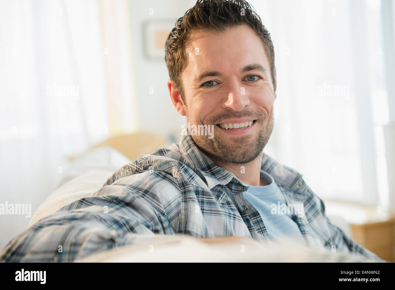 Portrait of content man Stock Photo - Alamy