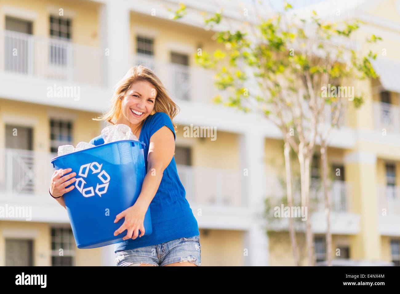 Woman bin recycling hi-res stock photography and images - Alamy