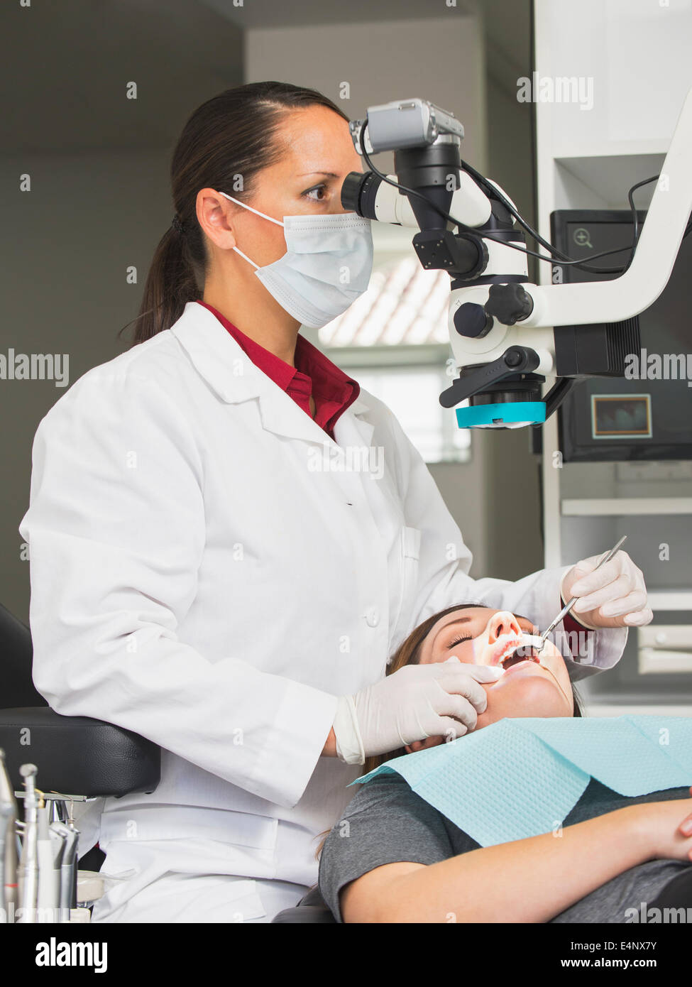 Dentist operation on patient Stock Photo - Alamy