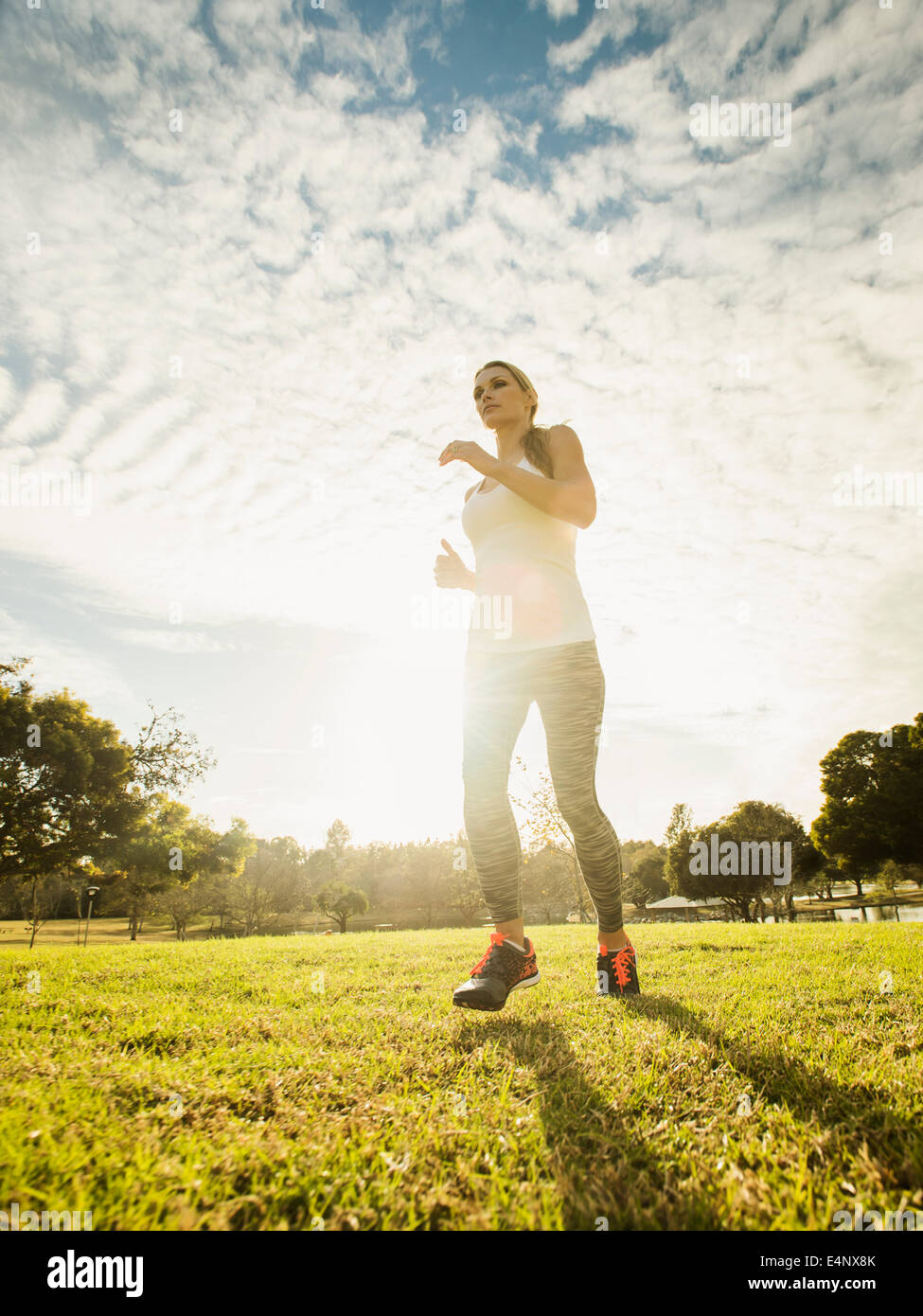 Woman running low angle hi-res stock photography and images - Alamy
