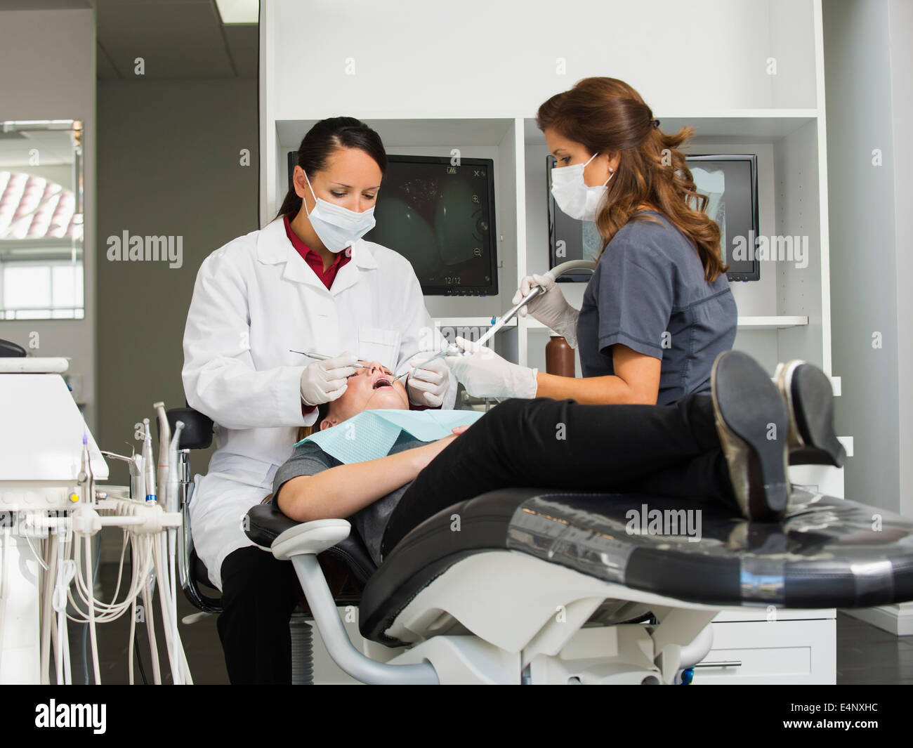 Dentist operation on patient Stock Photo - Alamy