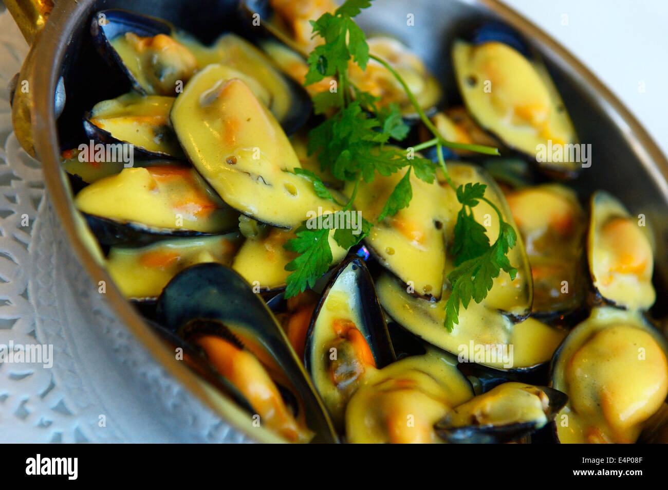 A plate of freshly cooked mussels. Poitou-Charentes. France Stock Photo ...