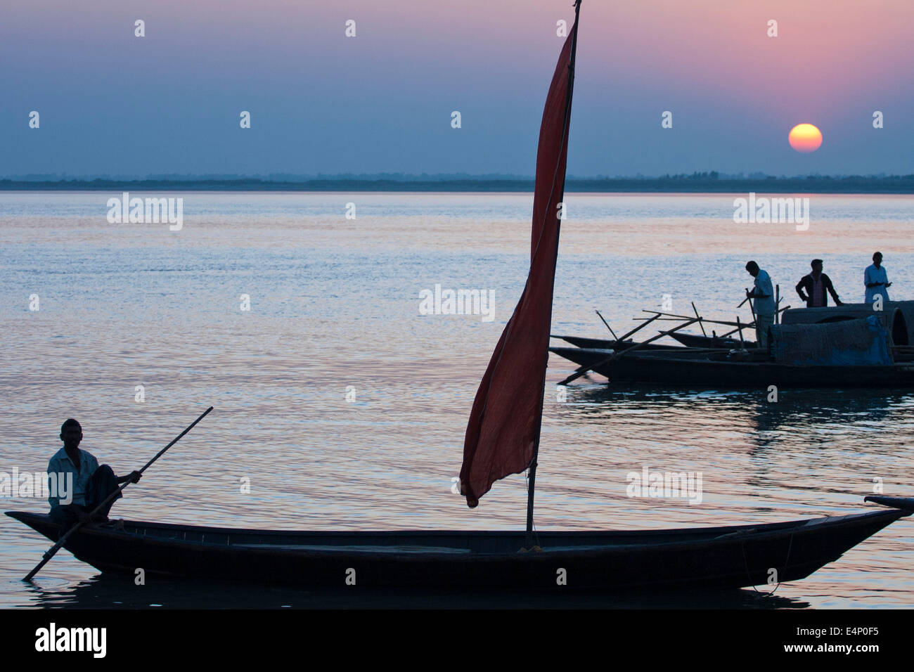 sunset in the river Stock Photo - Alamy