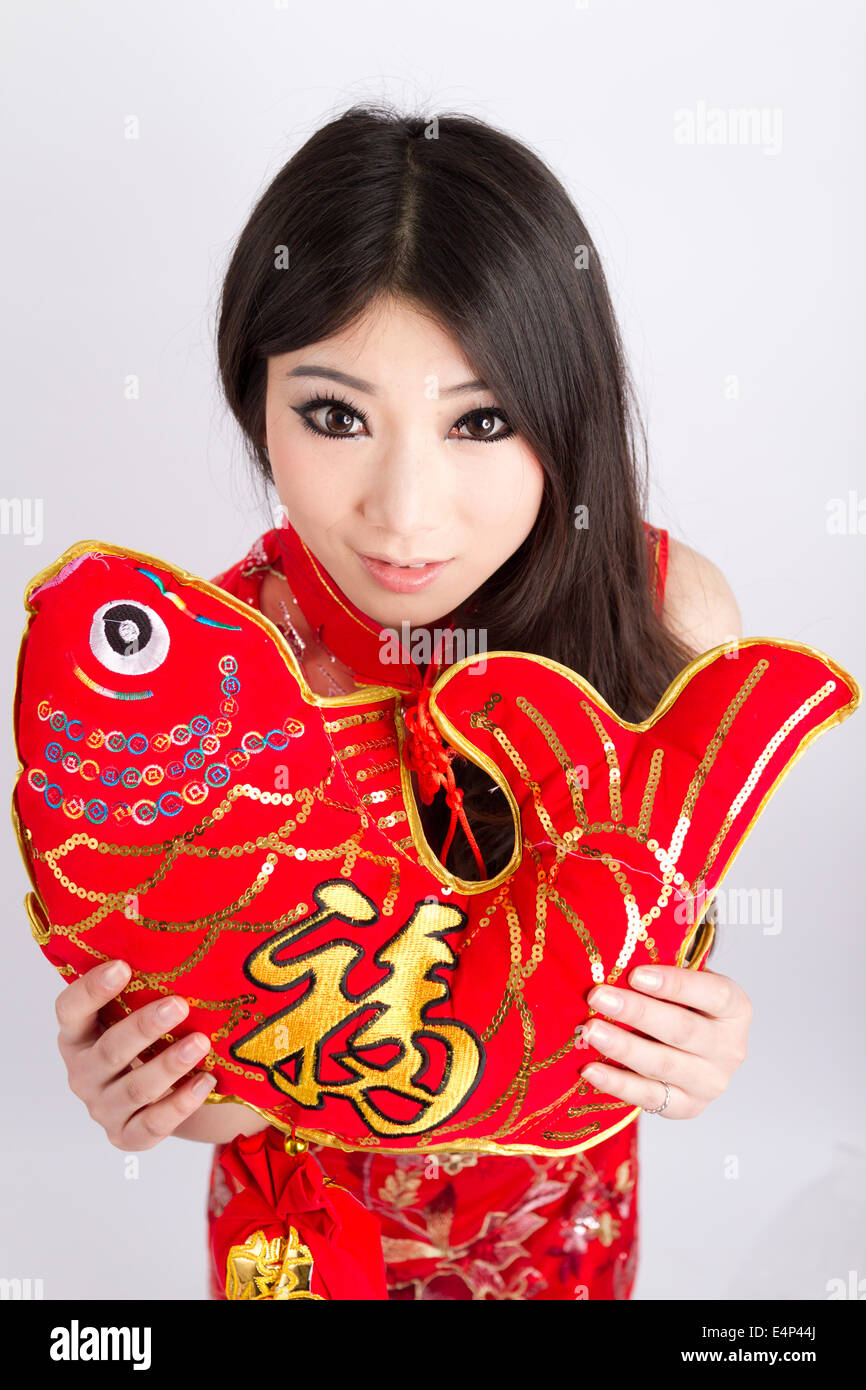 Wearing cheongsam Chinese pretty girl Stock Photo - Alamy