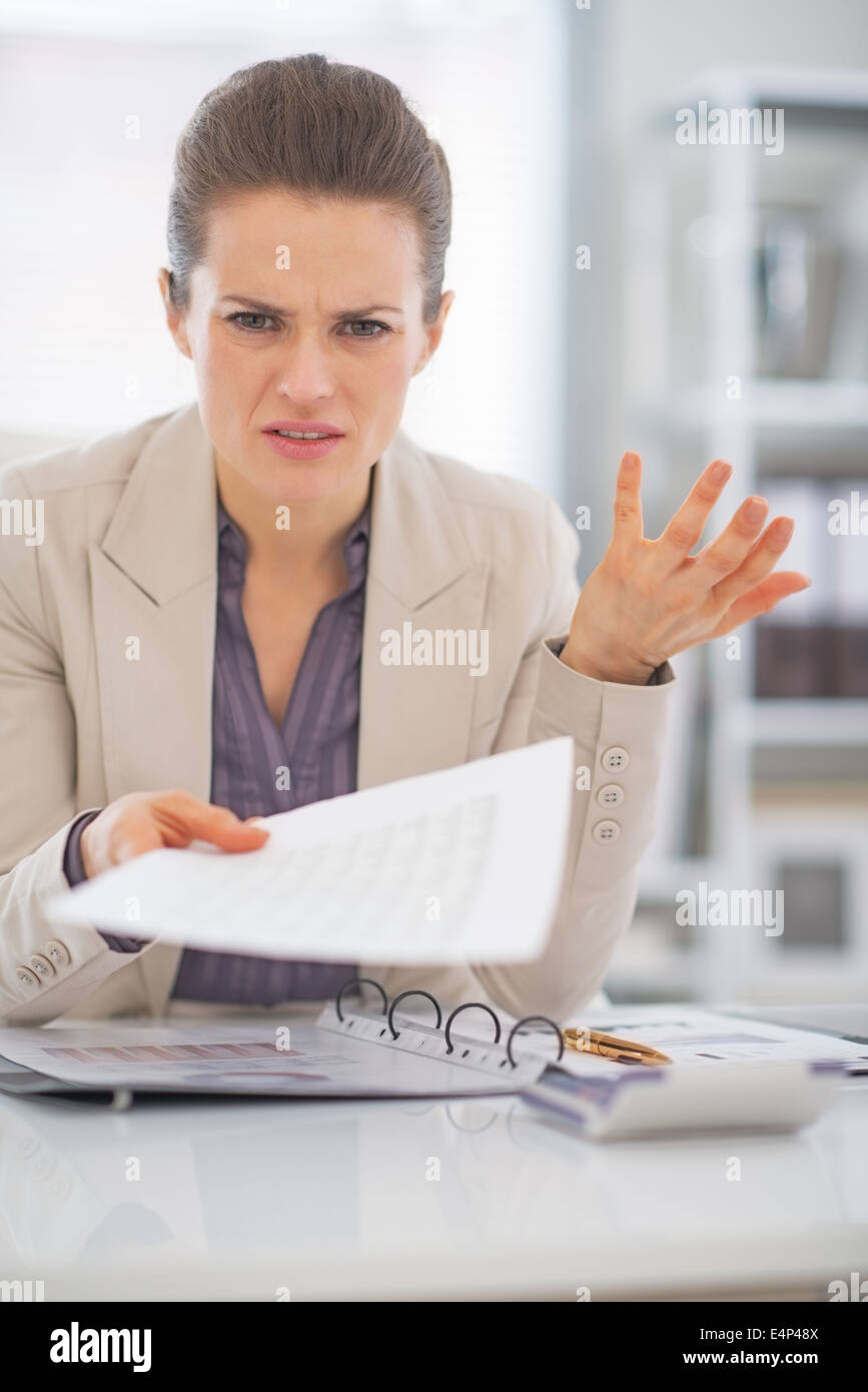 Portrait of frustrated business woman at work Stock Photo - Alamy