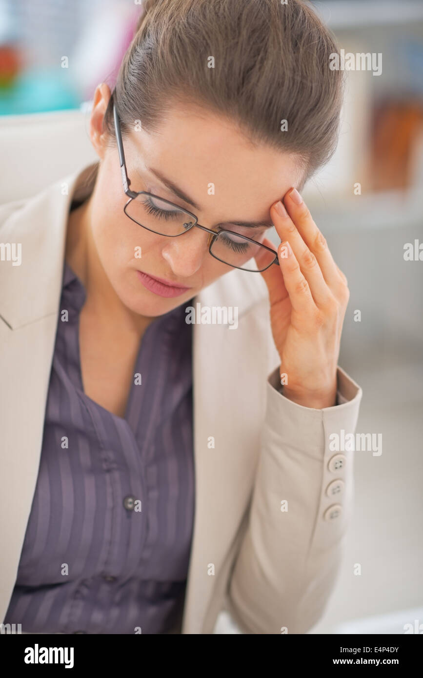 Portrait of frustrated business woman with eyeglasses in office Stock ...