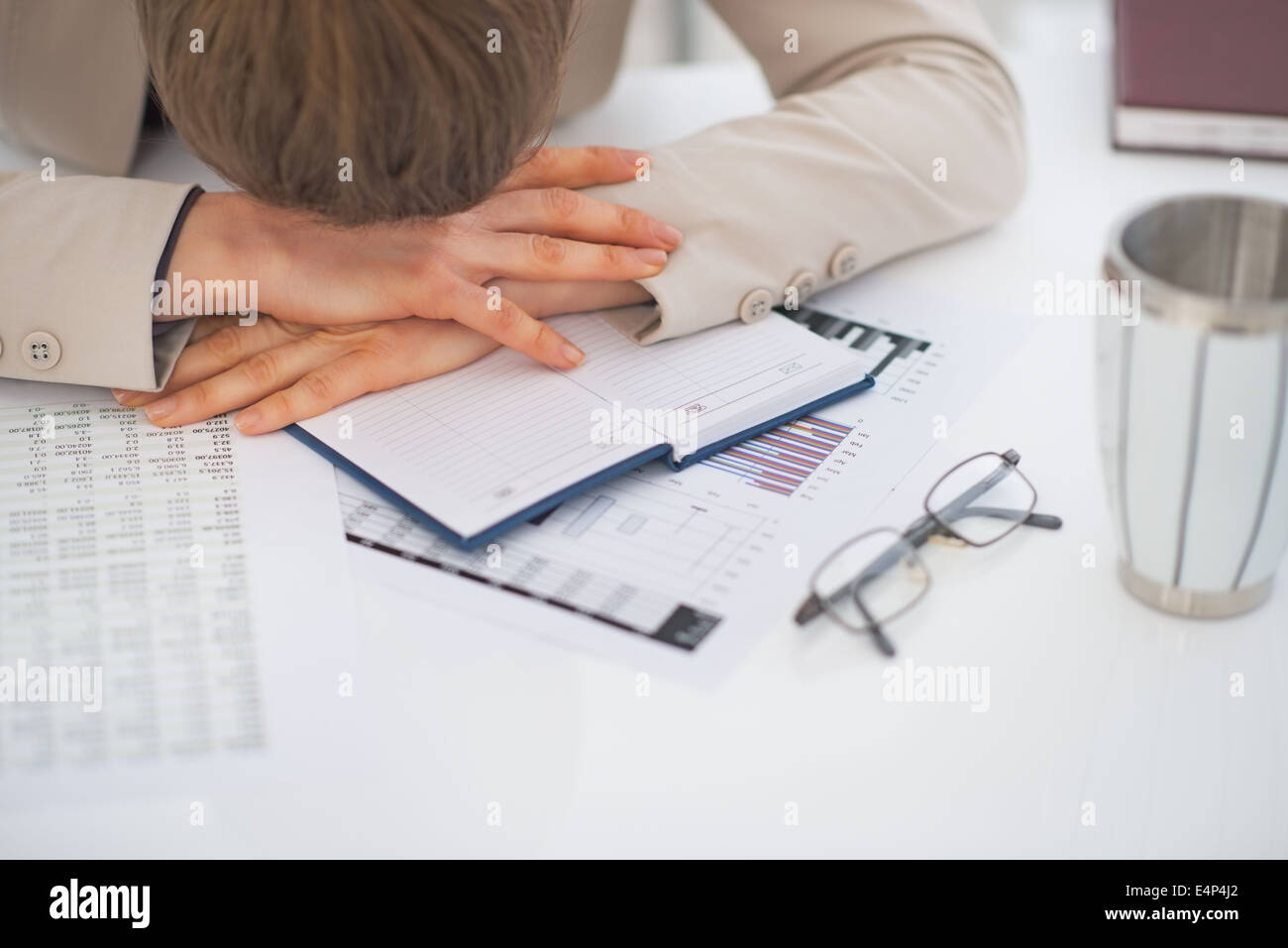 Closeup on tired business woman in office Stock Photo - Alamy