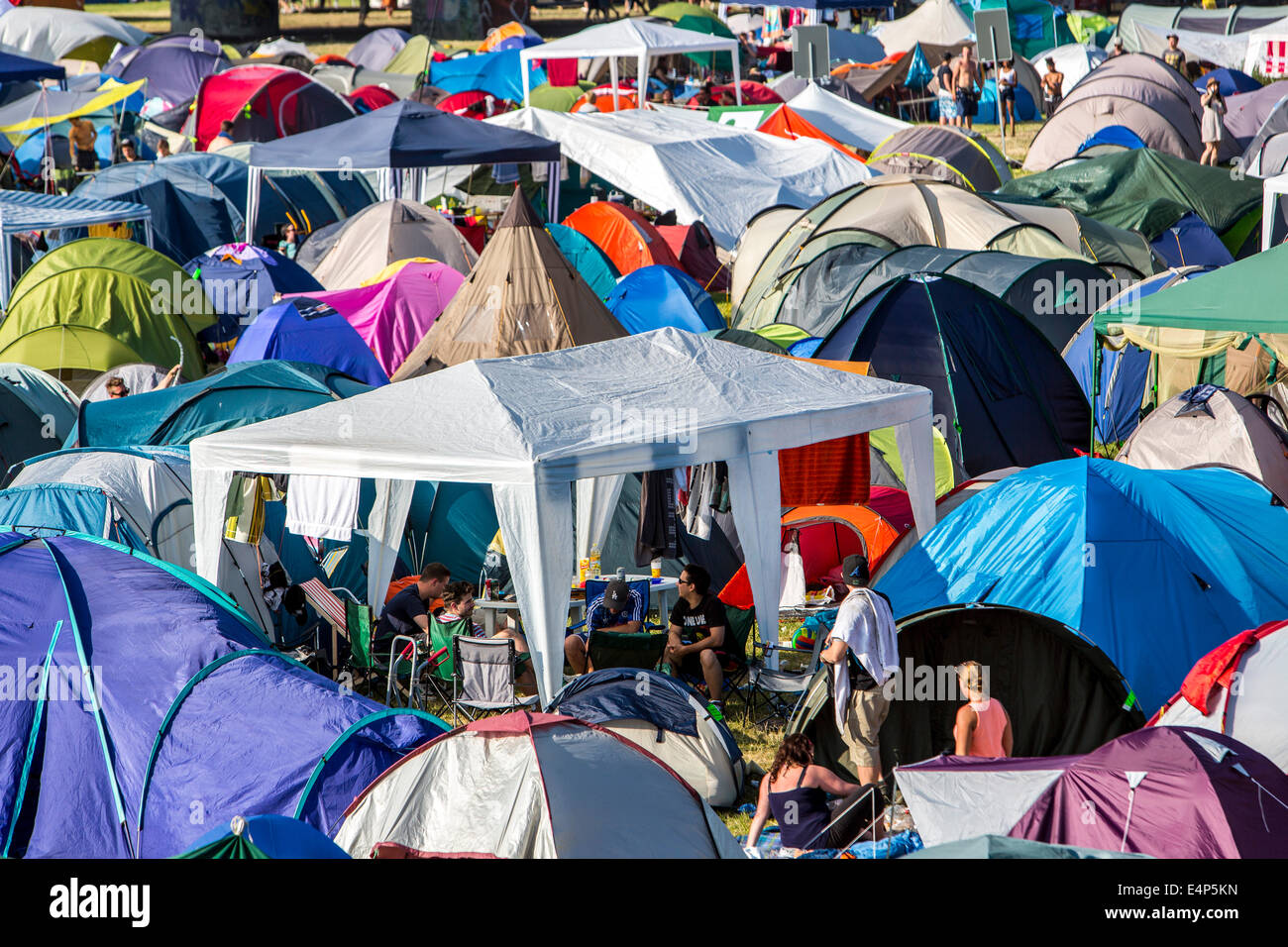 Many tents on a lawn, at an open air festival, camping Stock Photo - Alamy