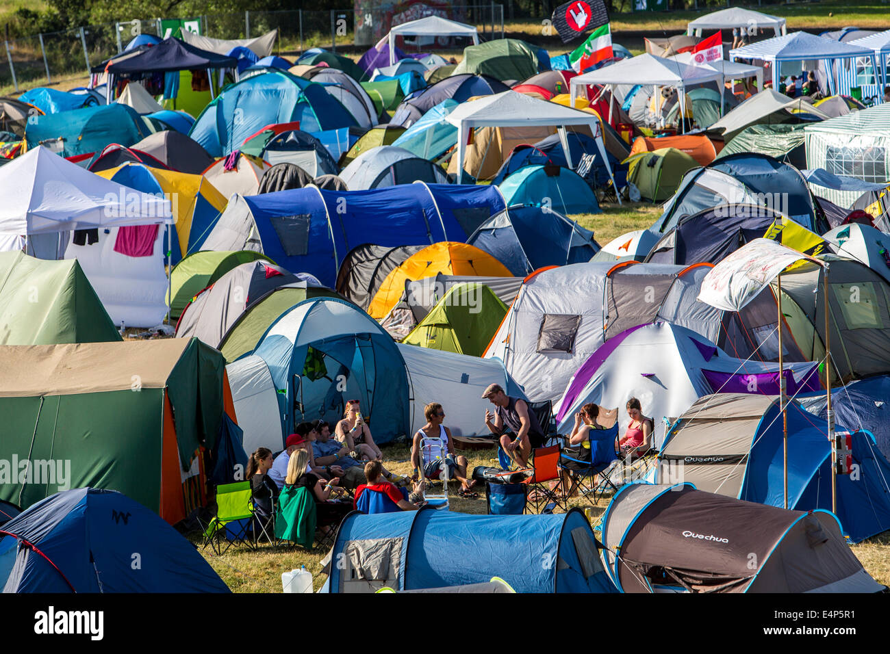 Many tents on a lawn, at an open air festival, camping Stock Photo - Alamy