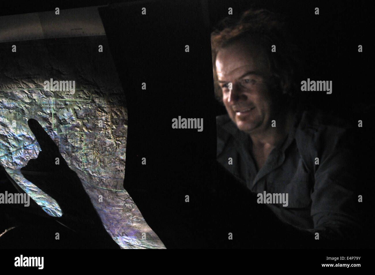 Finger pointing at map hi-res stock photography and images - Alamy