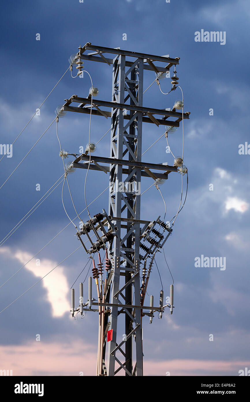Electricity pylons with high-voltage wires Stock Photo - Alamy