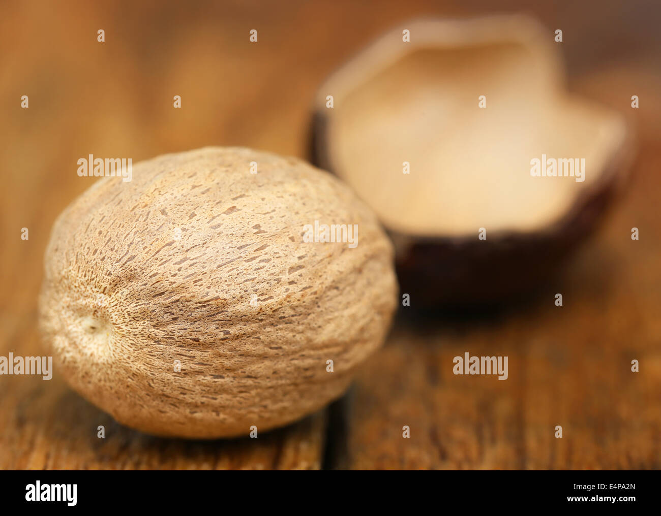 Nutmeg or Jaifal Spice on wooden surface Stock Photo - Alamy