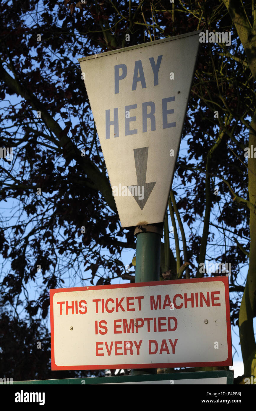 Car park sign and security notice Stock Photo - Alamy