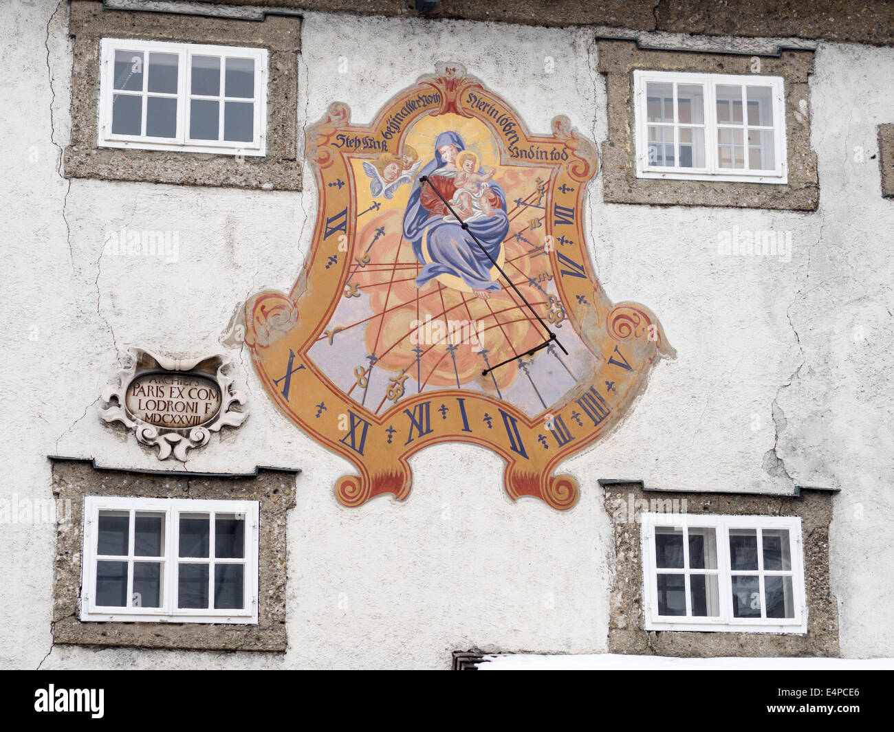 Madonna & Christ Sundial. A bright painted image of Mary and Jesus on a ...